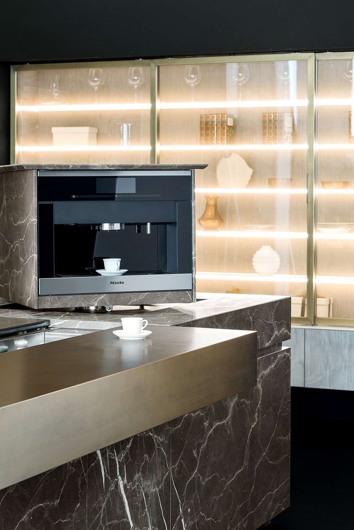 A big monolith in natural stone and bronze