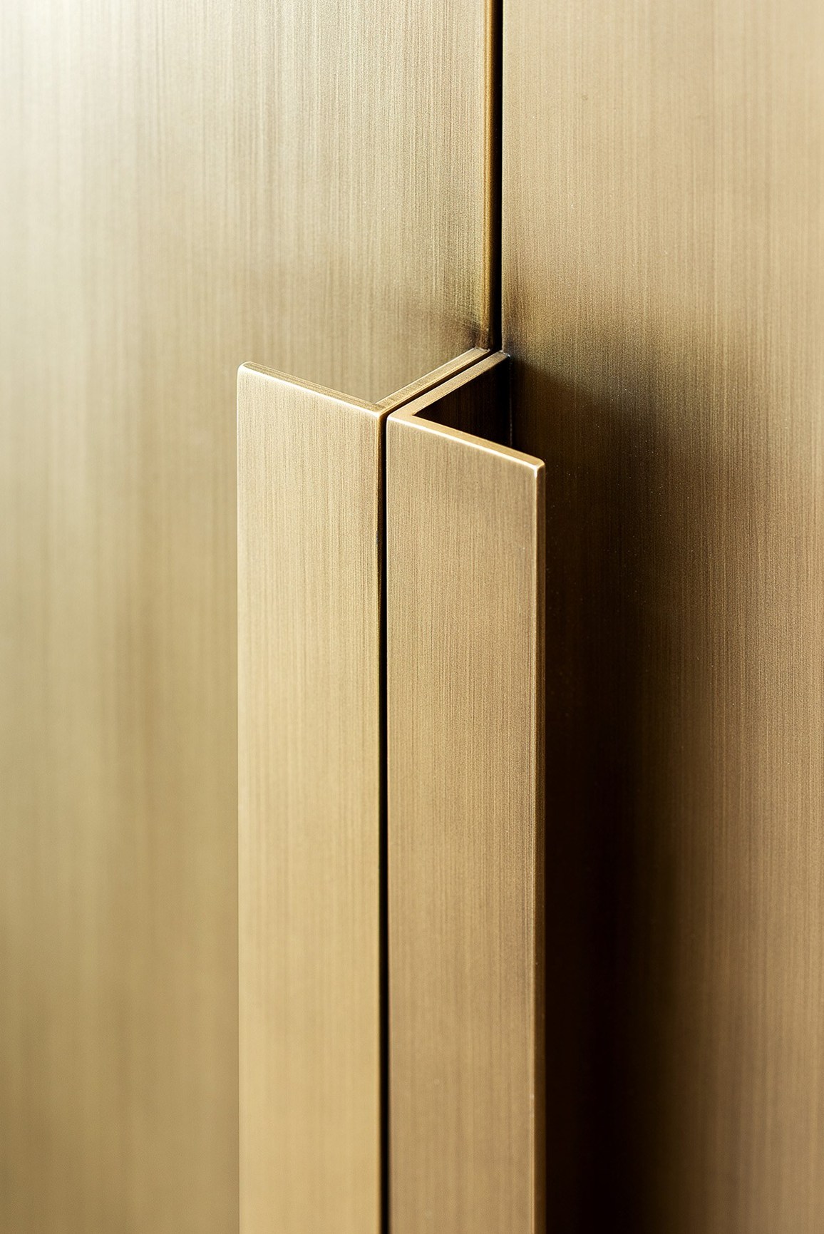 A big monolith in natural stone and bronze