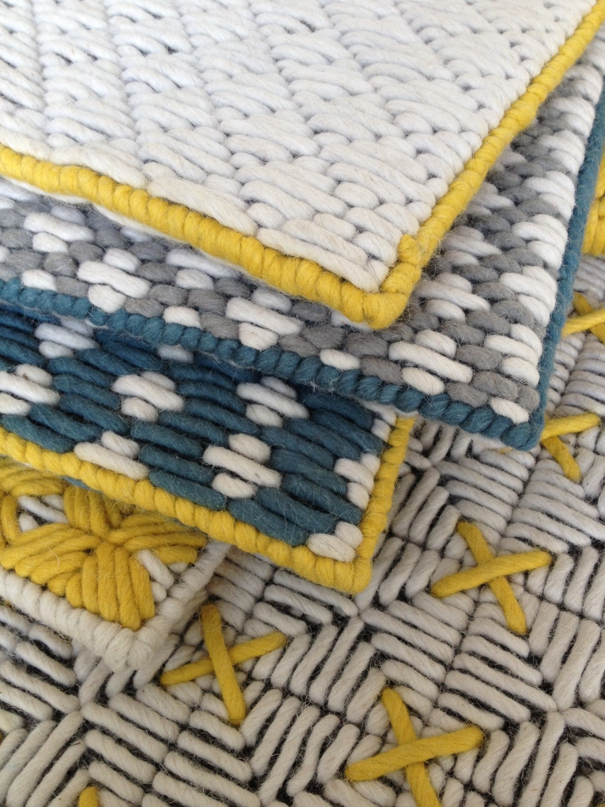 Wool woven on plastic lattice creates a hand-stitched look