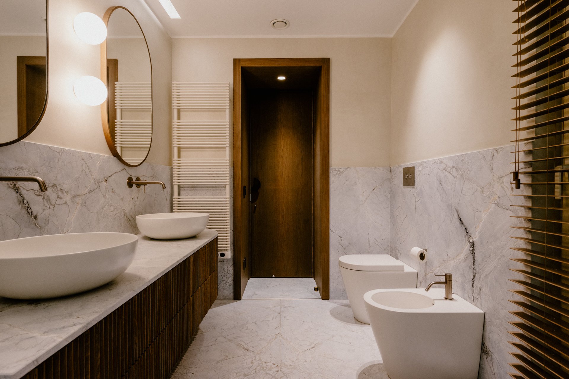 Custom-made Antolini® natural stone cladding and furnishings for a ...