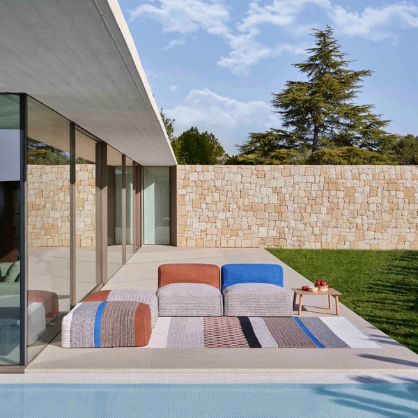 The GAN collection of outdoor poufs and rugs designed by Patricia Urquiola