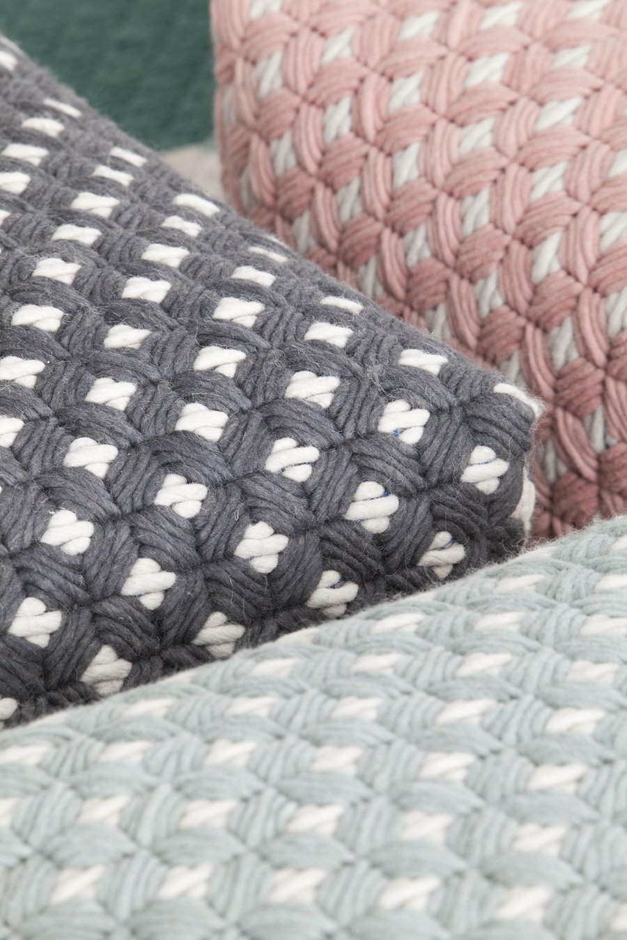 Wool woven on plastic lattice creates a hand-stitched look