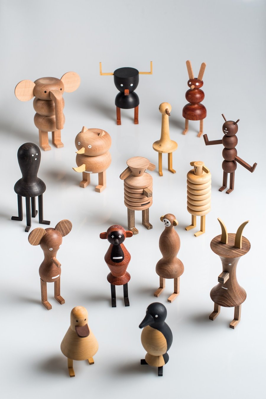 A cheerful crew of wooden creatures