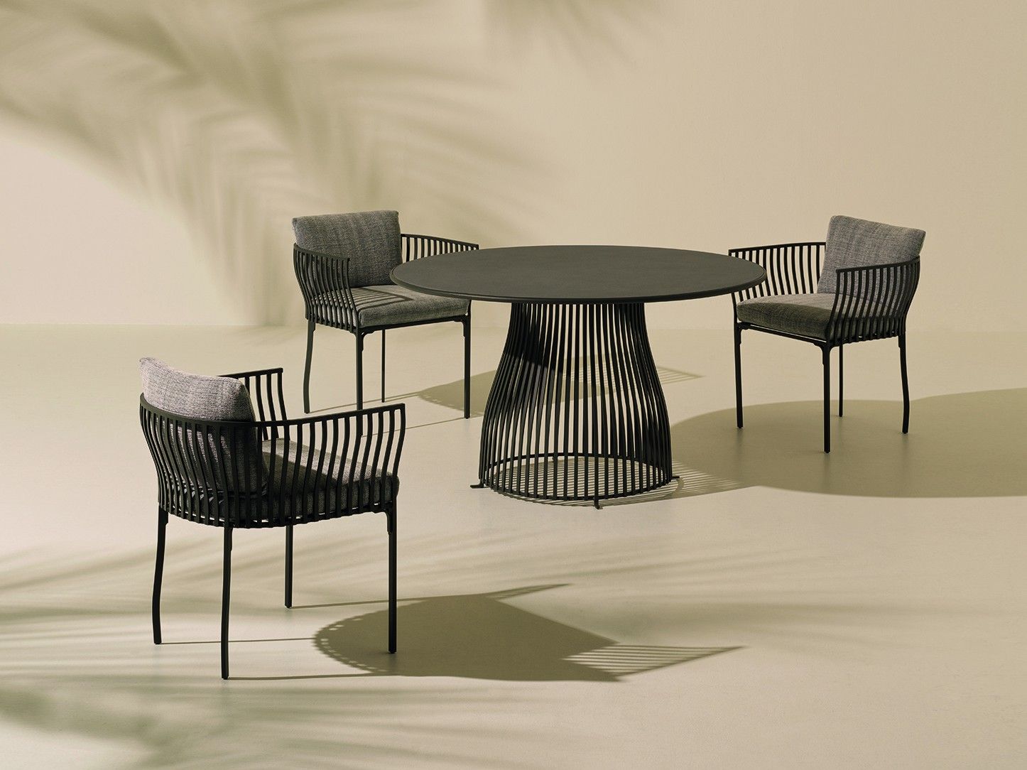 Bold and Venexia, the Ethimo outdoor tables