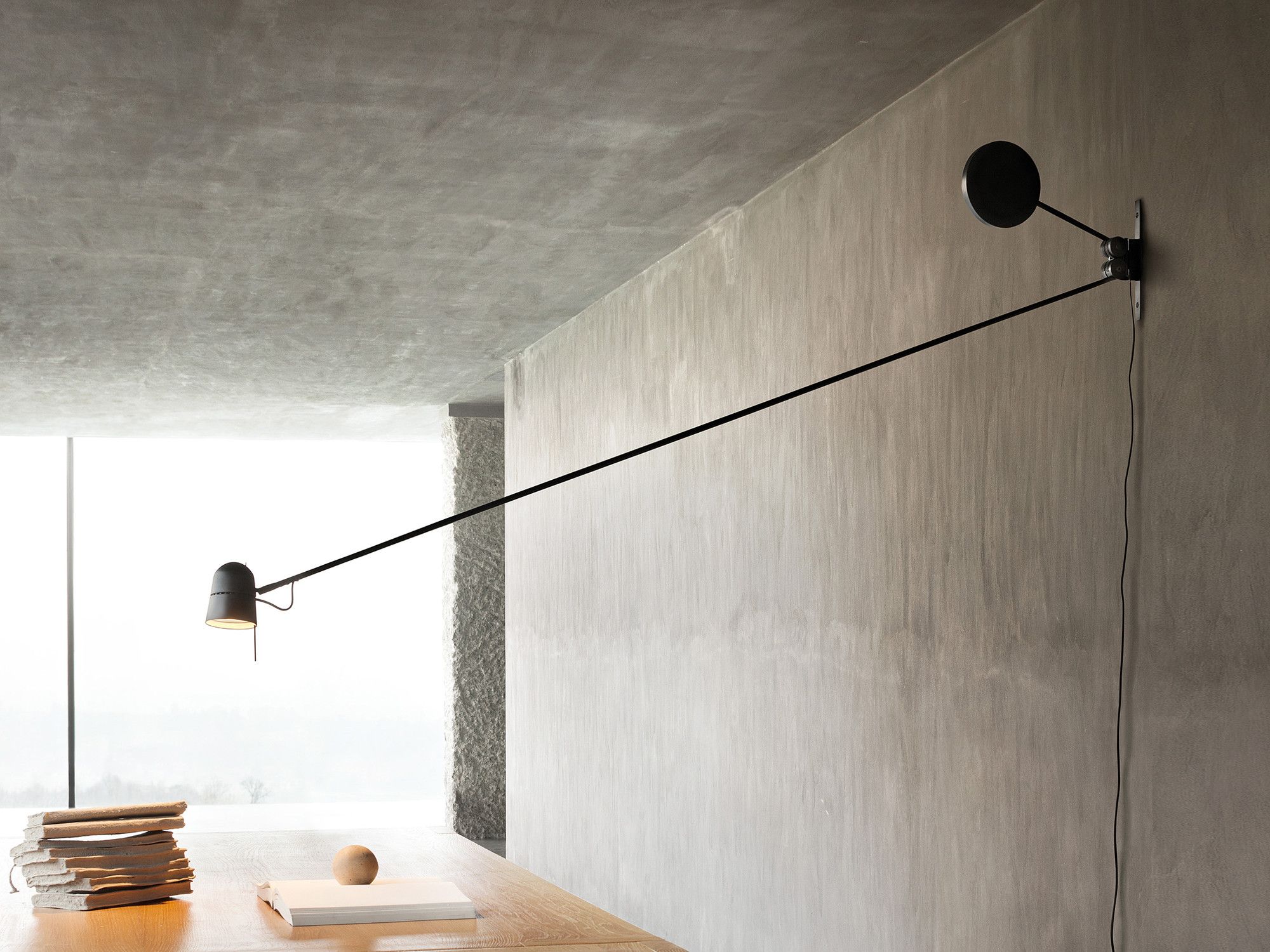 The Counterbalance wall lamp by Luceplan in red version