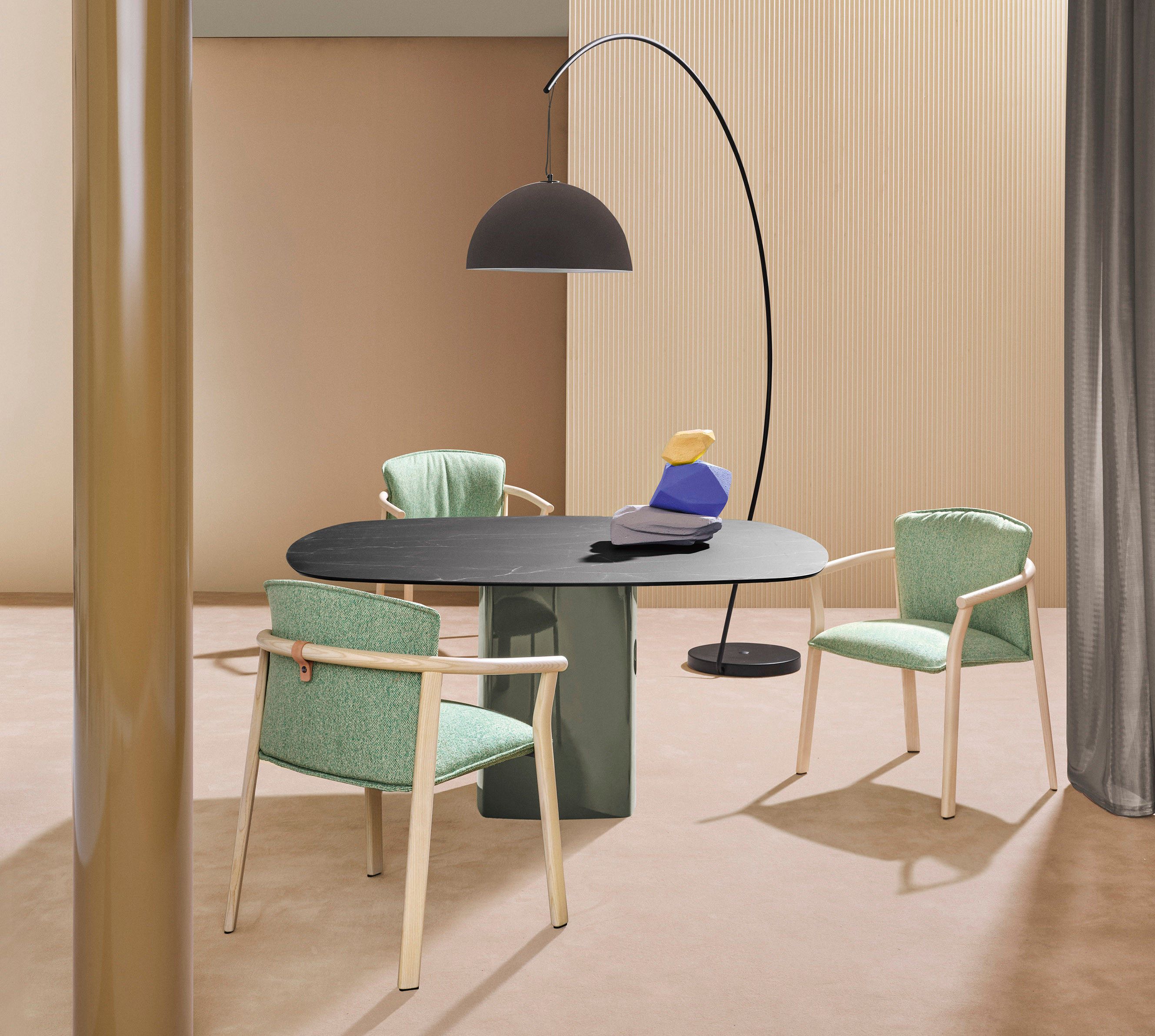 The Pedrali wooden armchair designed by CMP Design