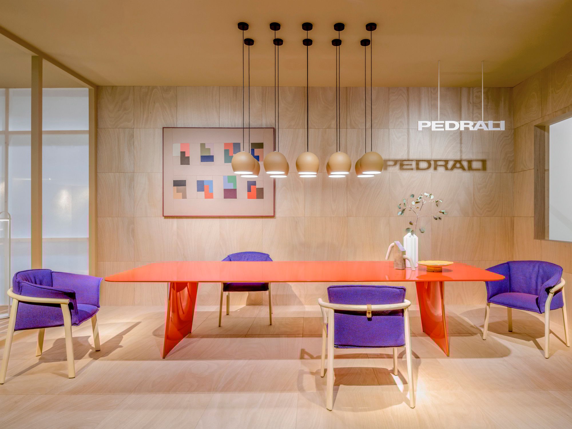 The Pedrali wooden armchair designed by CMP Design