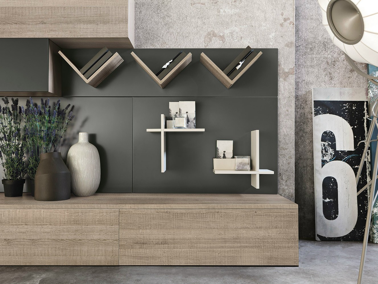 A magnetic wall system which can be fitted with shelves and accessories