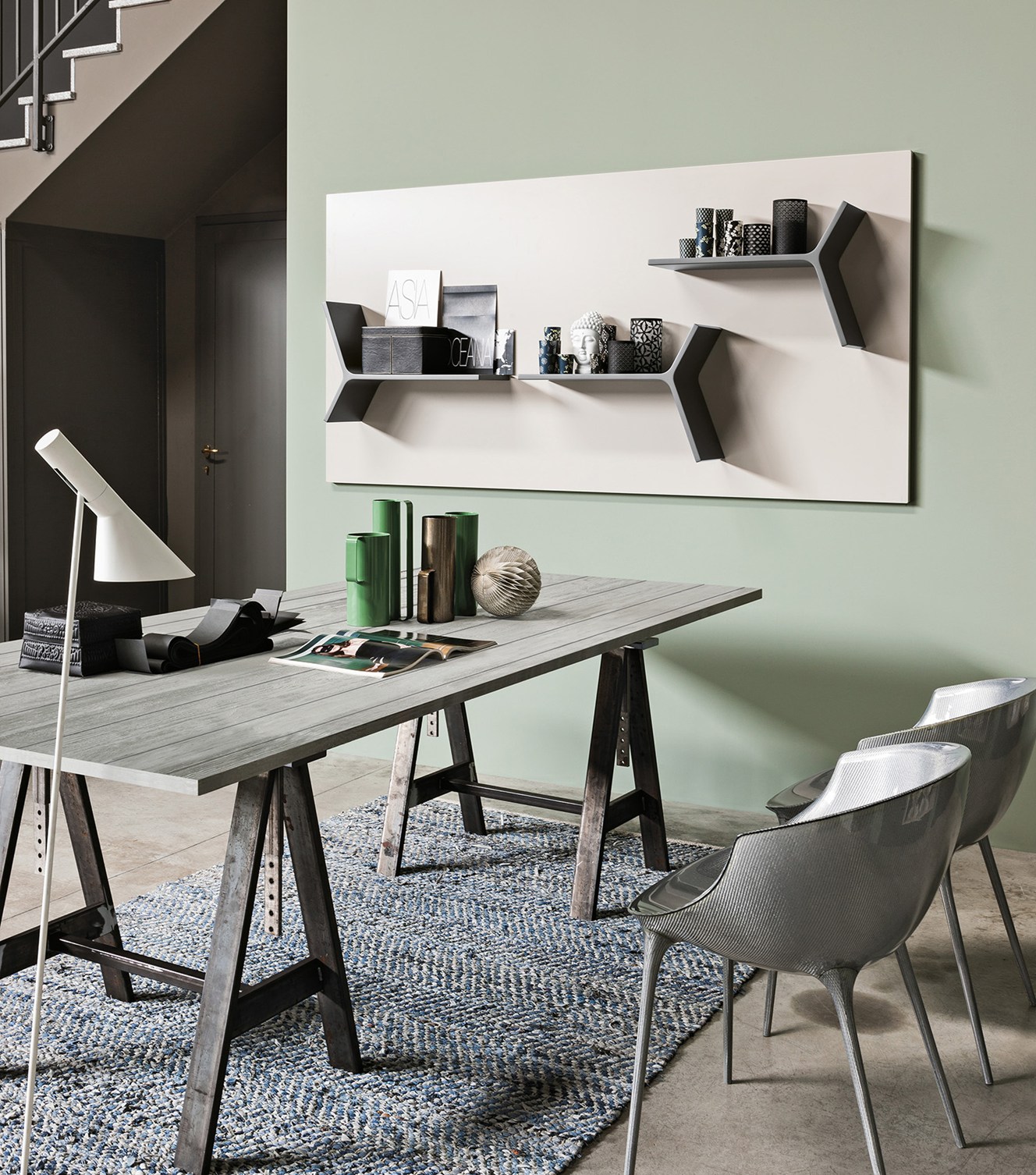 A magnetic wall system which can be fitted with shelves and accessories