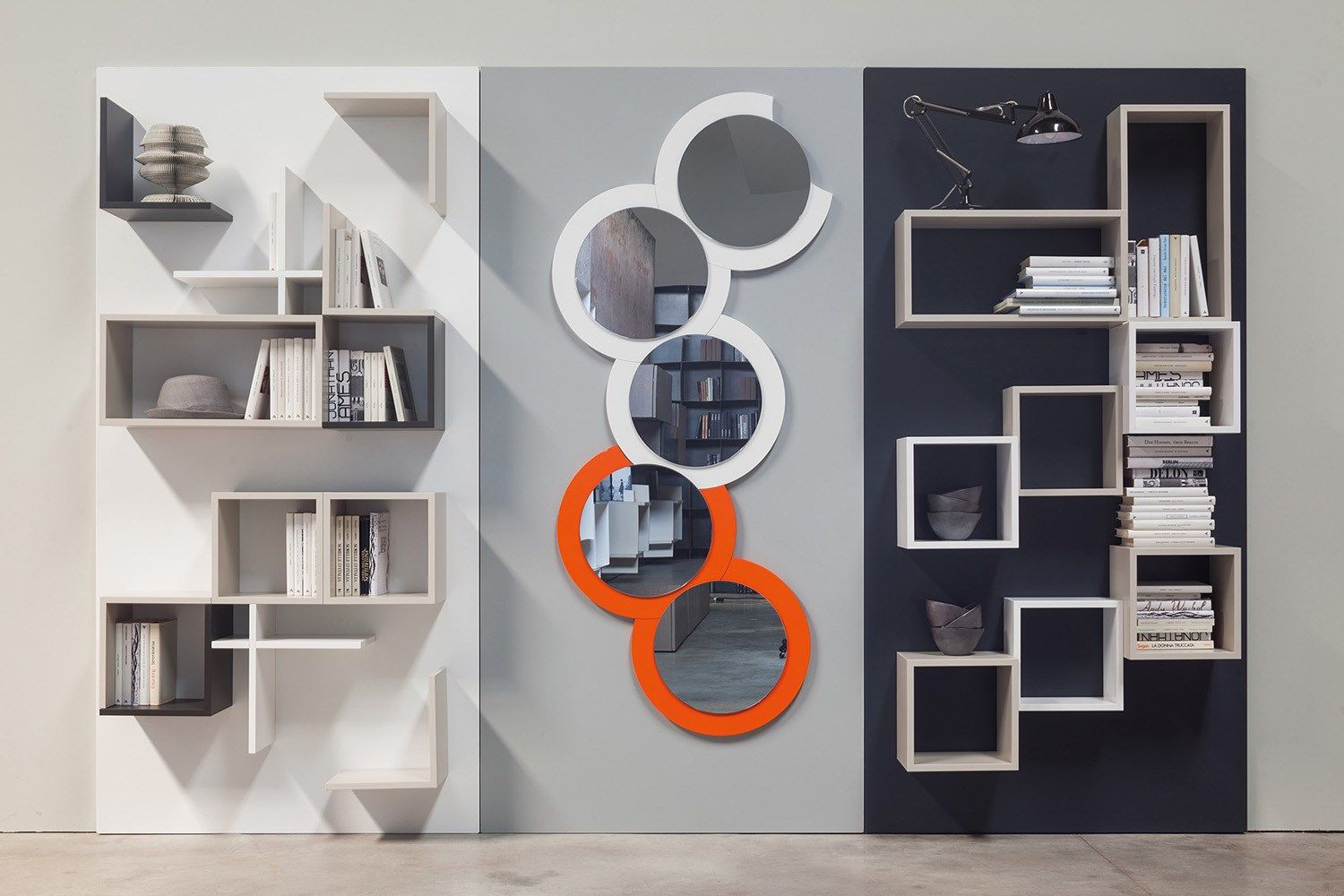 A magnetic wall system which can be fitted with shelves and accessories