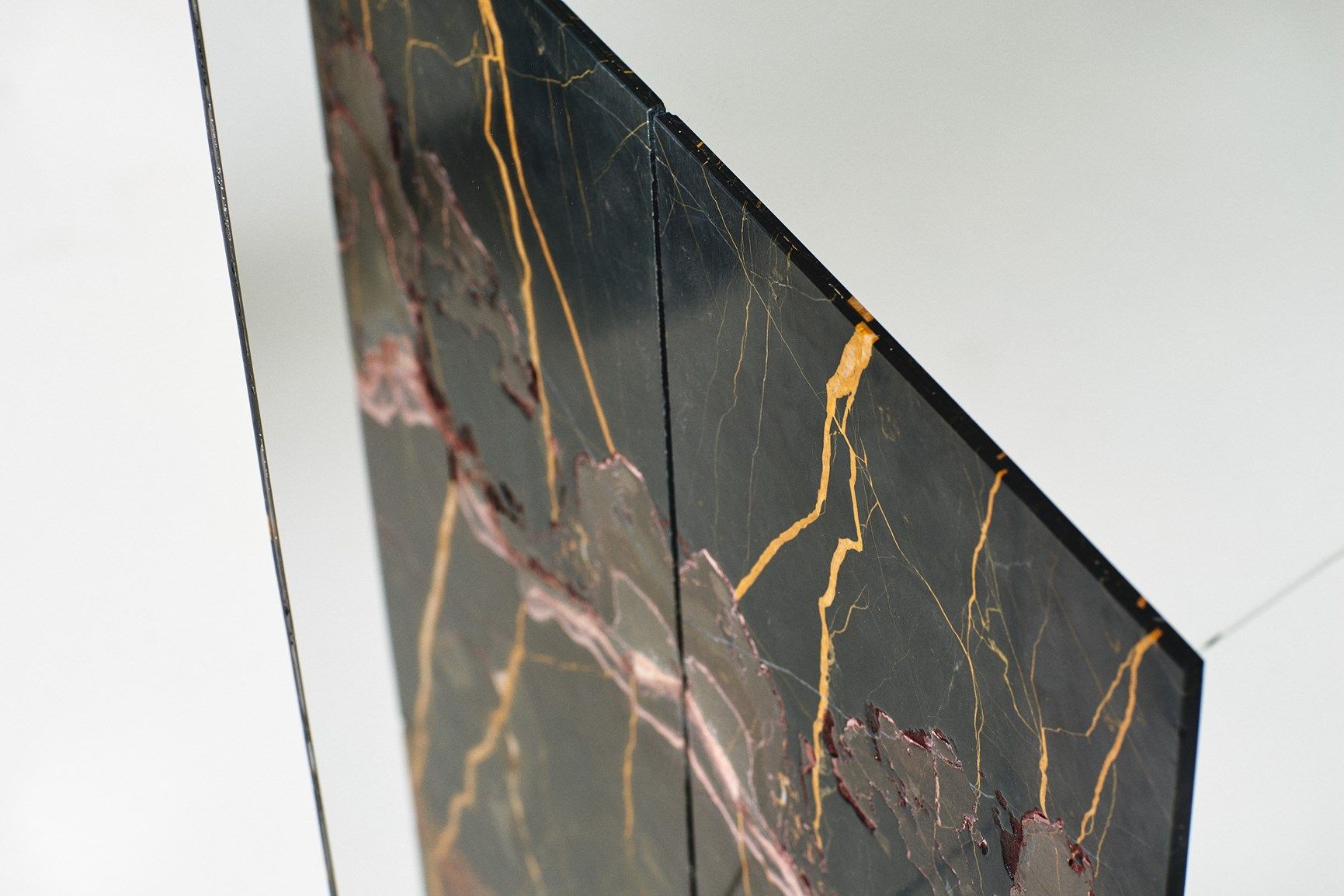 'Material Collisions'. Marble-Mirror Architectural Sculptures