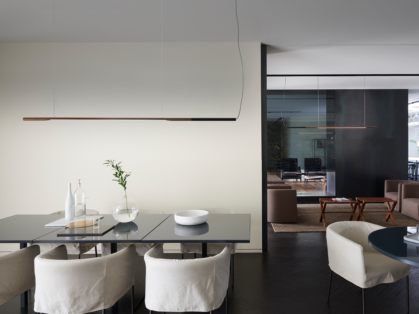 A Slender Graphic Mark Conceals the Light Source