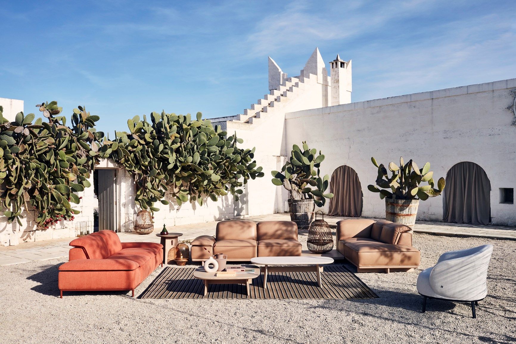 Natuzzi sofas and poufs at Fuorisalone 2022