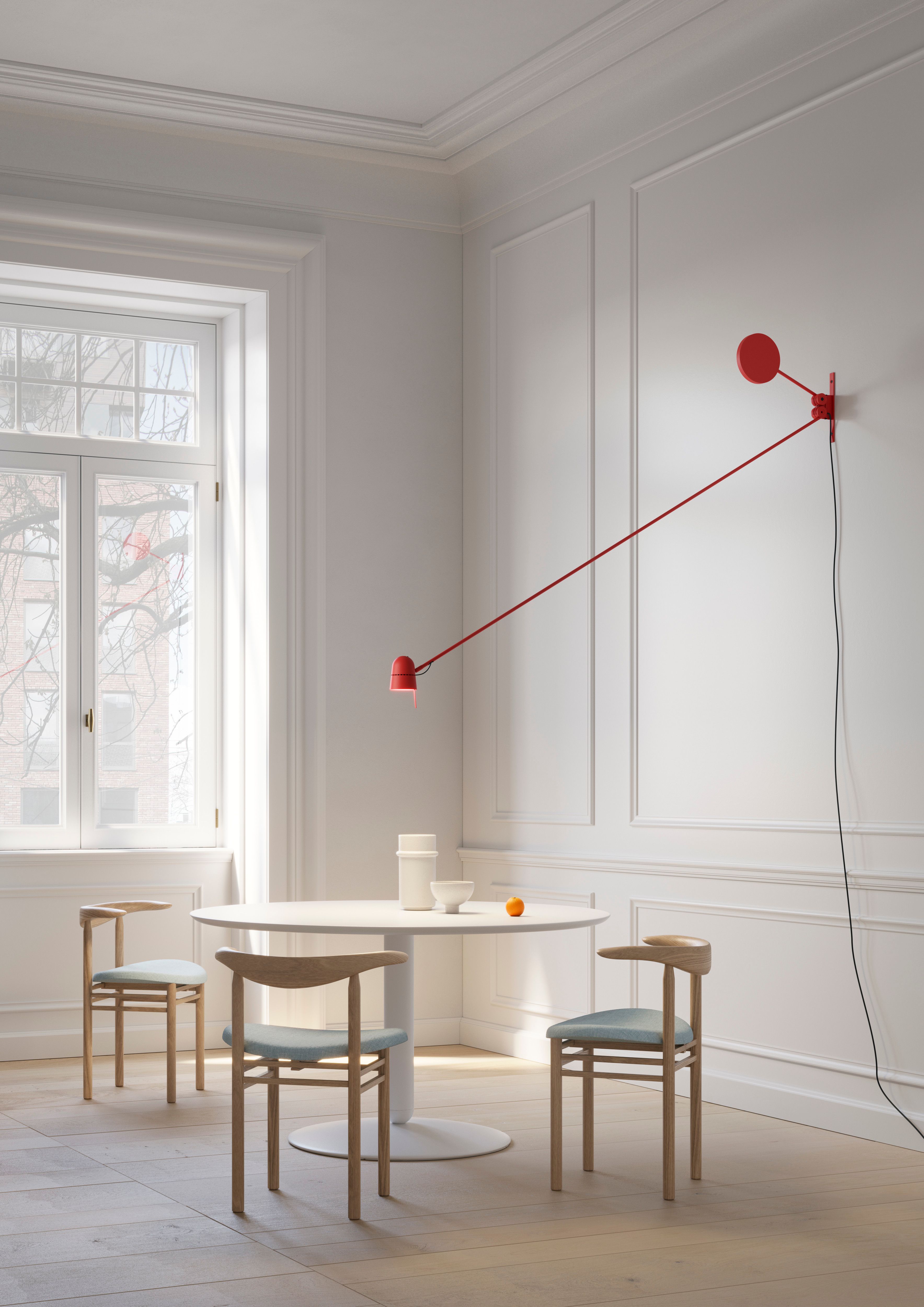 The Counterbalance wall lamp by Luceplan in red version