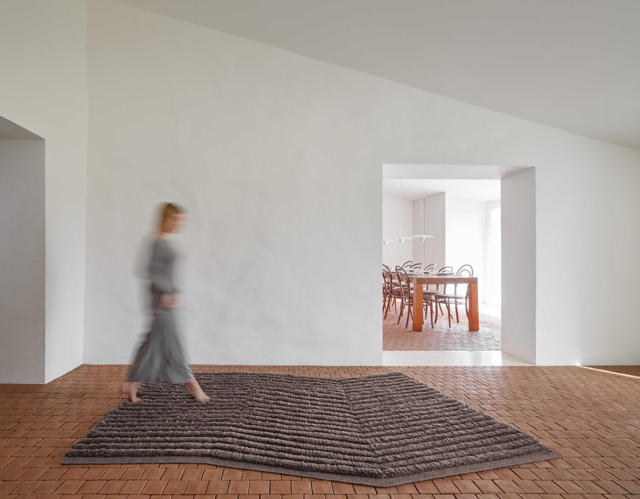 GAN rugs and cushions in natural wool and recycled PET