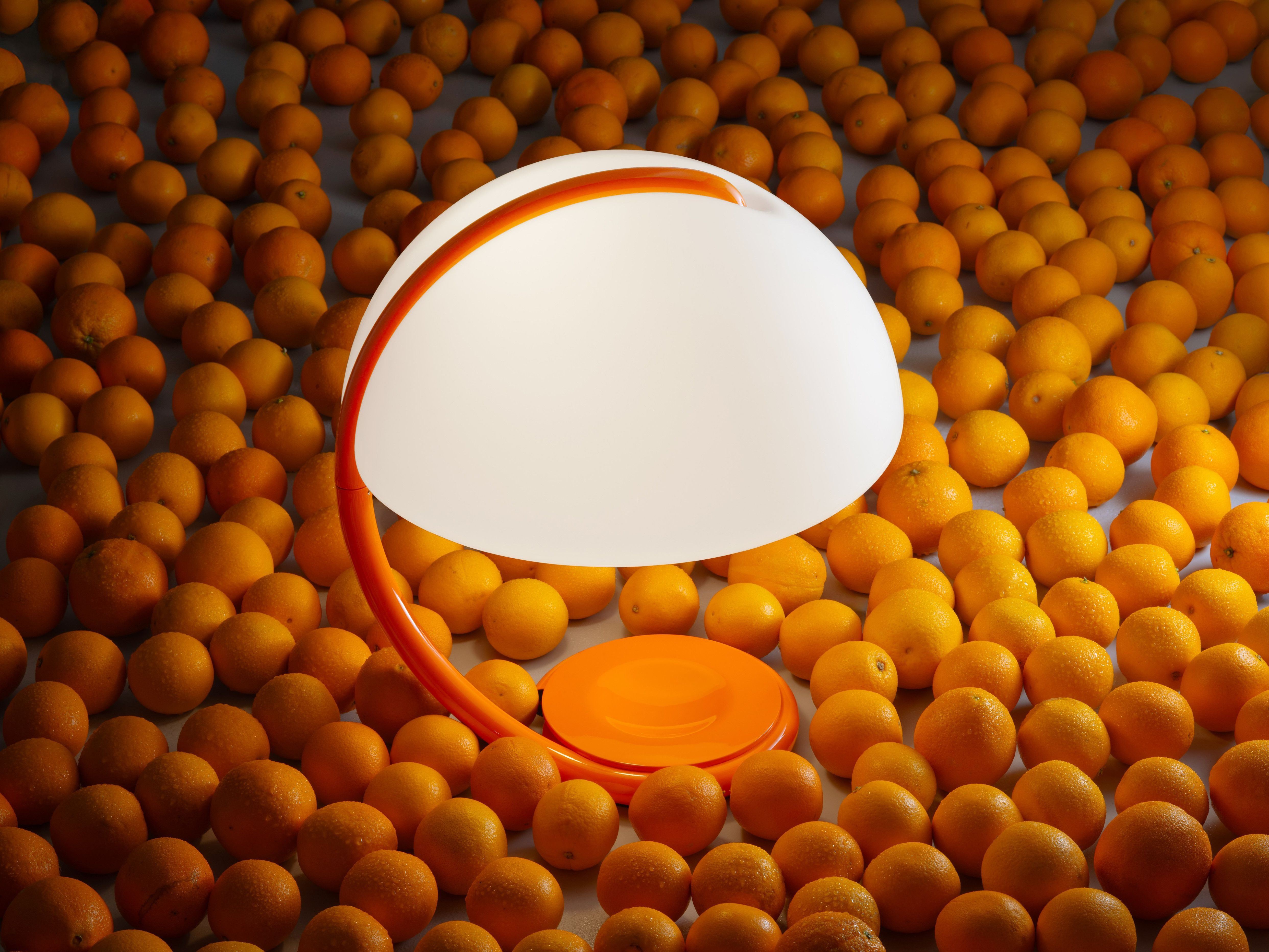 The Serpente lamp by Martinelli Luce in orange