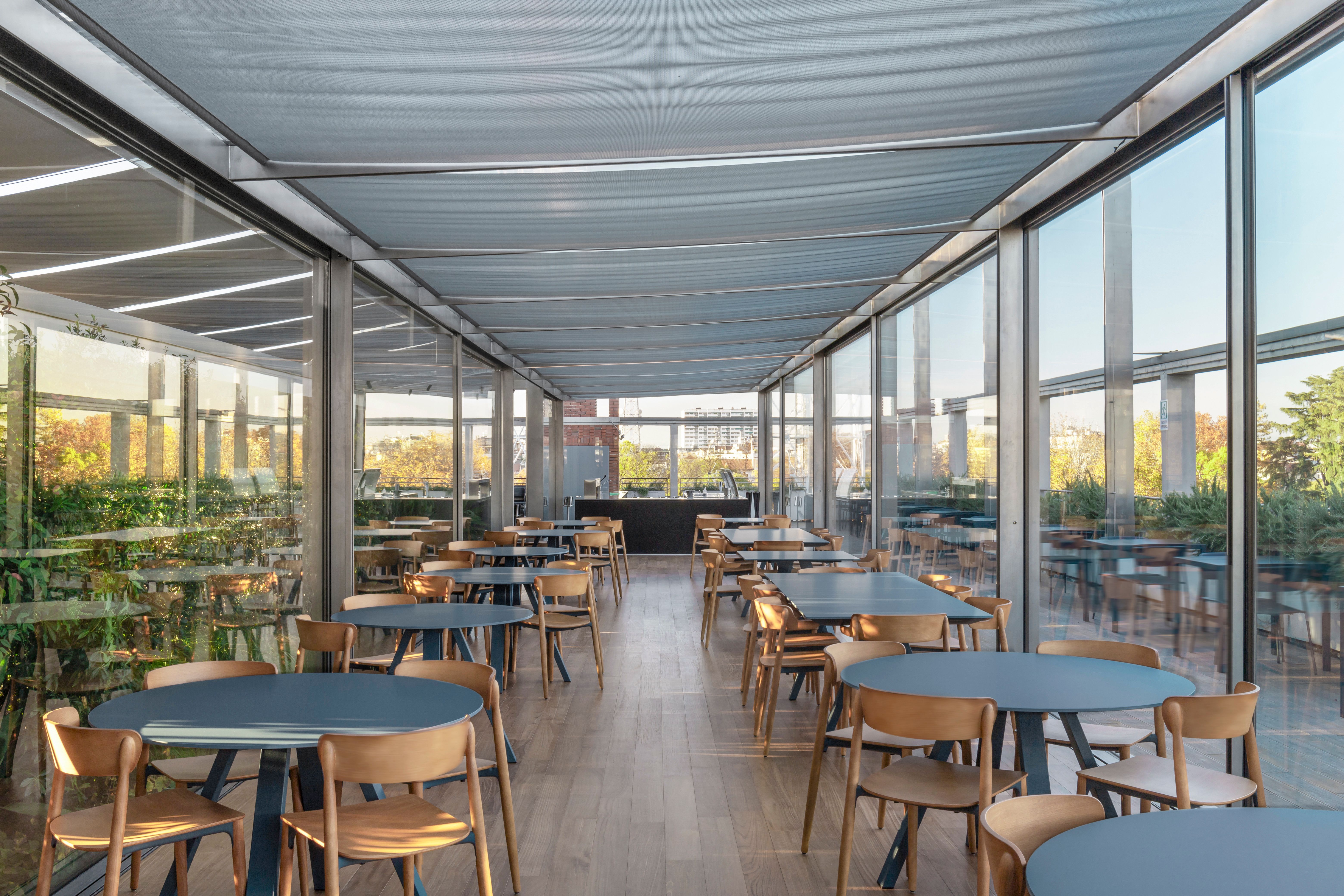 Pedrali tables and chairs furnish Terrazza Triennale restaurant in Milan