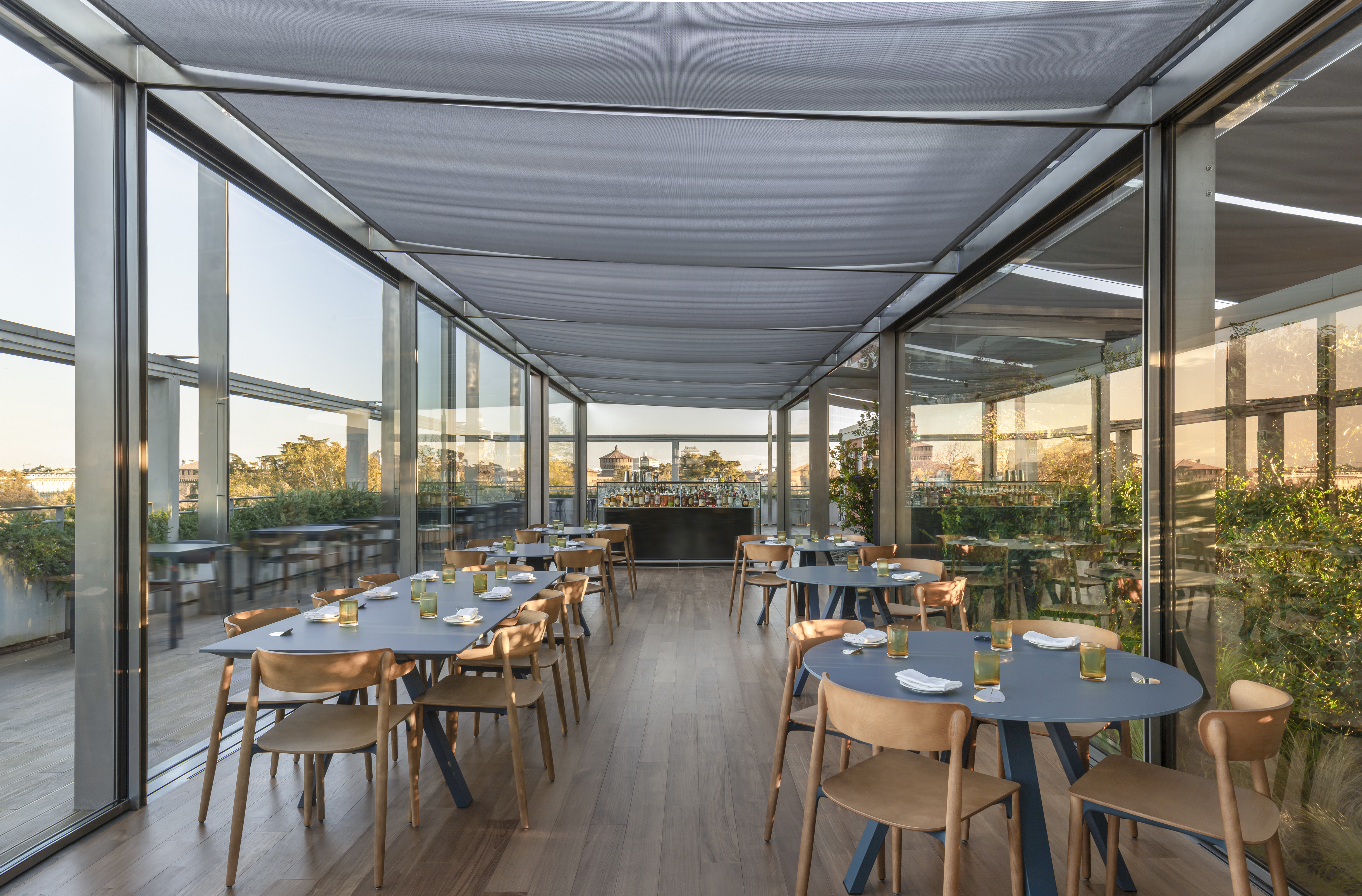 Pedrali tables and chairs furnish Terrazza Triennale restaurant in Milan