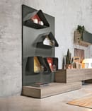 A magnetic wall system which can be fitted with shelves and accessories