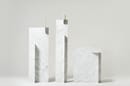 'Material Collisions'. Marble-Mirror Architectural Sculptures