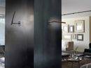 A Slender Graphic Mark Conceals the Light Source