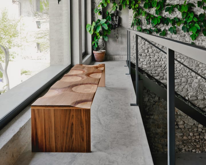 The Ripples wooden bench designed by Toyo Ito for Horm turns 20