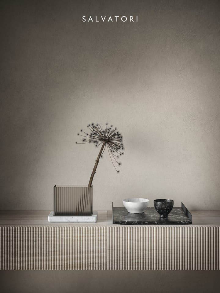 Arredi, rivestimenti e lavabi in marmo Salvatori per un attico a Torino