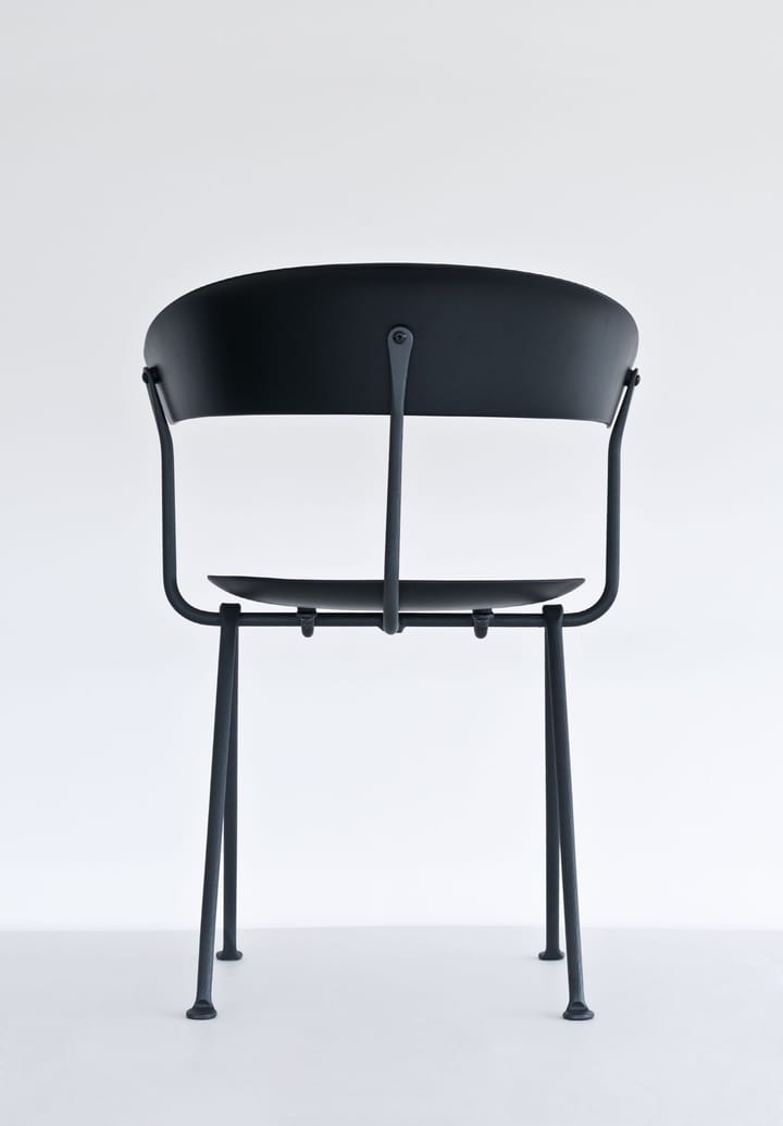 A system of forged iron legs supports surfaces of different sizes and ...