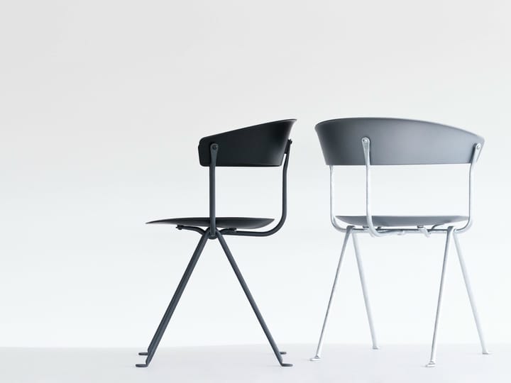 A system of forged iron legs supports surfaces of different sizes and ...