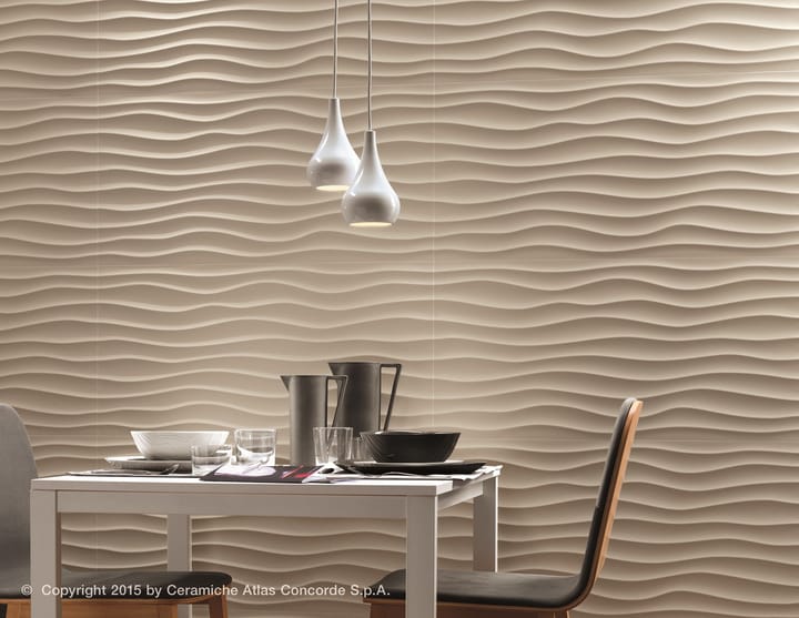 A vibrant sculptural effect dresses the walls