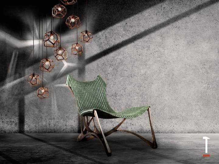 Steel and natural materials merge in innovative midcentury modern pieces