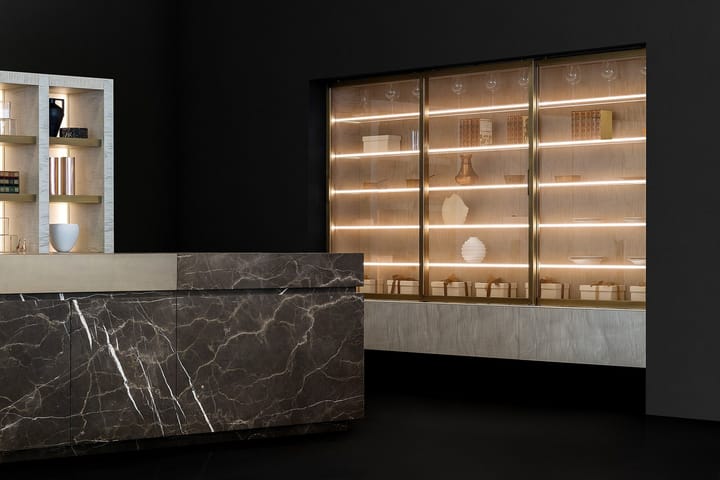 A big monolith in natural stone and bronze