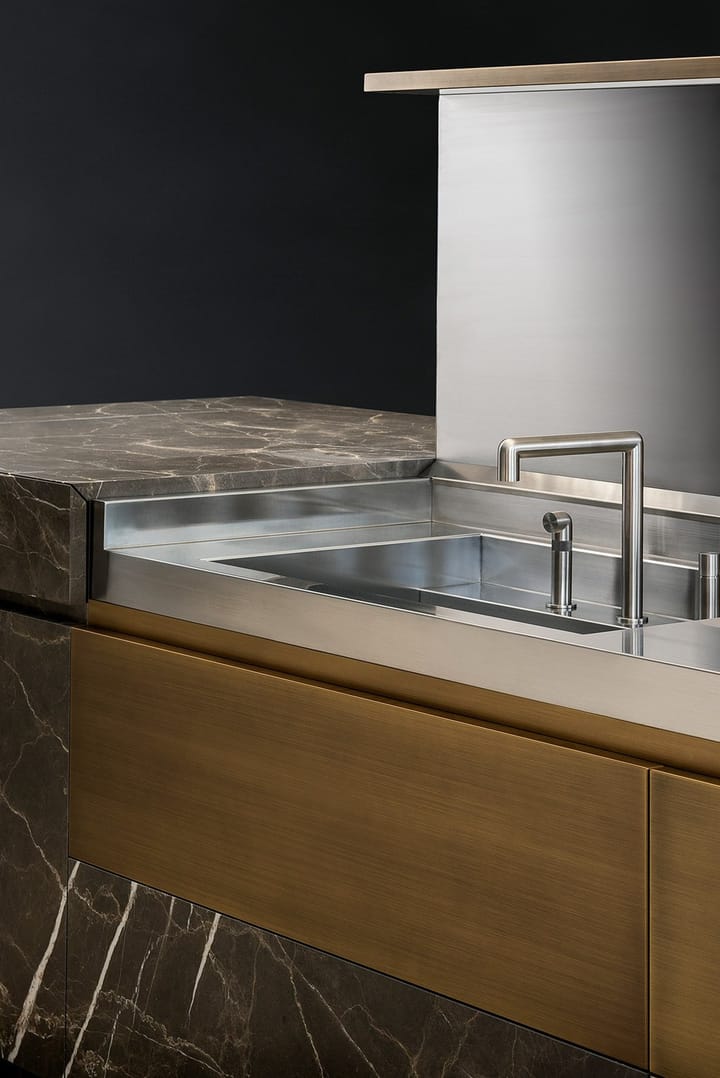 A big monolith in natural stone and bronze