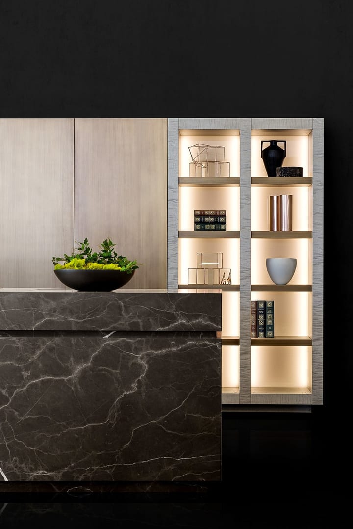 A big monolith in natural stone and bronze