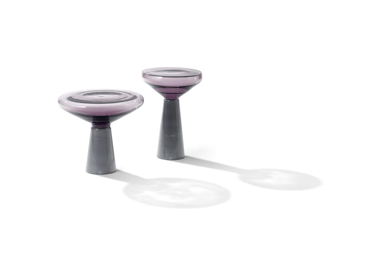 Natural stone merges with glass