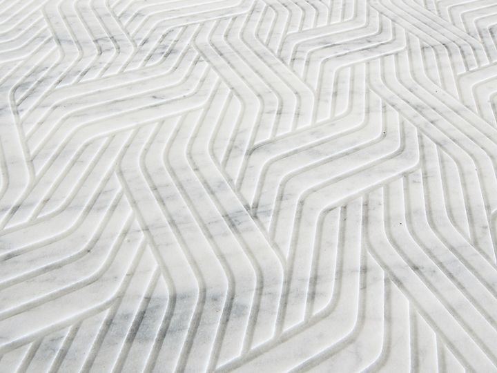 Micro-engraving on marble and stone