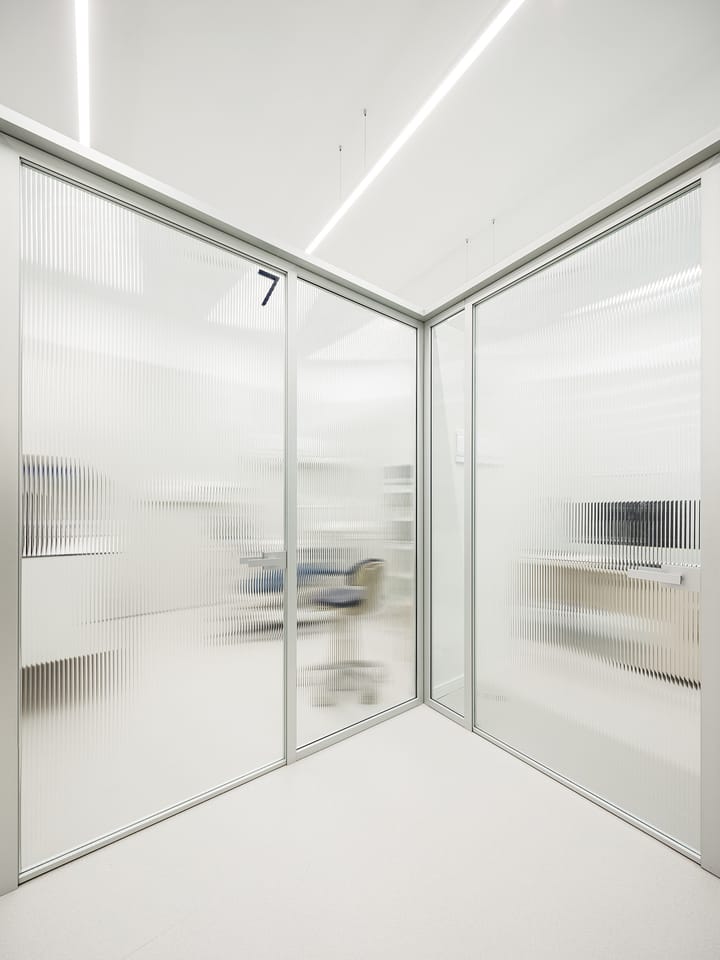 Albed's All Ways glass partition wall system for a clinic in San Sebastian