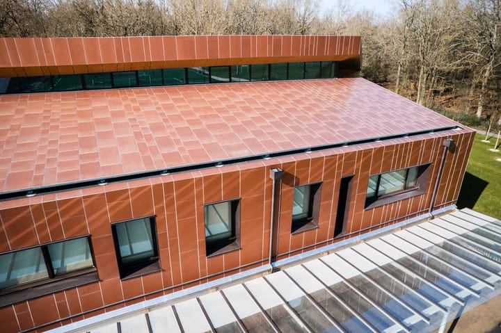 Carea mineral composite cladding for a Passivhaus school
