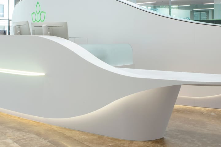 The HIMACS Solid Surface for a fluid shapes reception desk