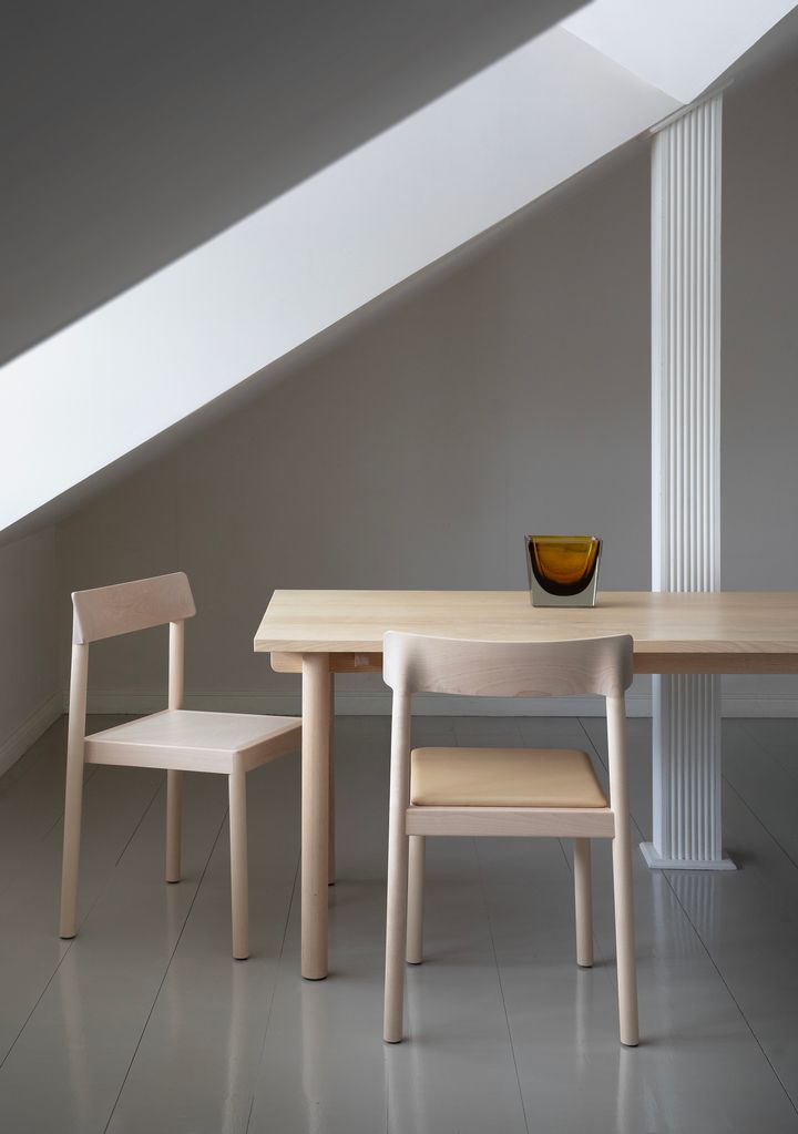 Nikari Kumu Chair: Stackable Wooden Design for Modern Spaces