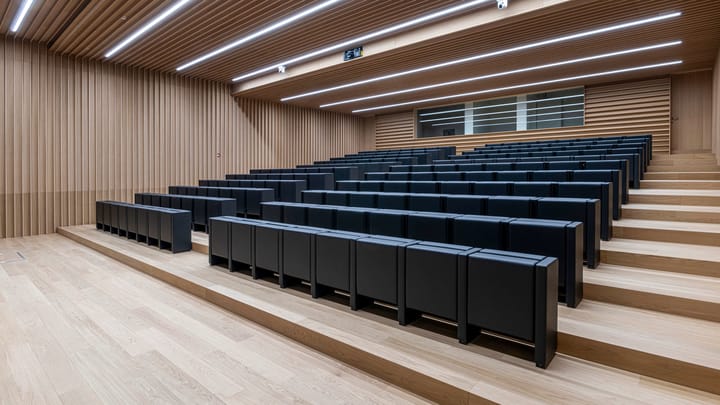 The compact Mura seats by LAMM for the auditorium of the Noi Techpark ...