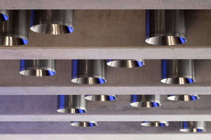 Acoustic attenuation with integrated lights system by iGuzzini for the ...