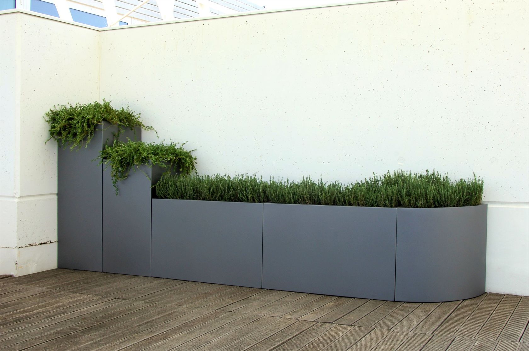A Modular stainless steel planter By BLOSS