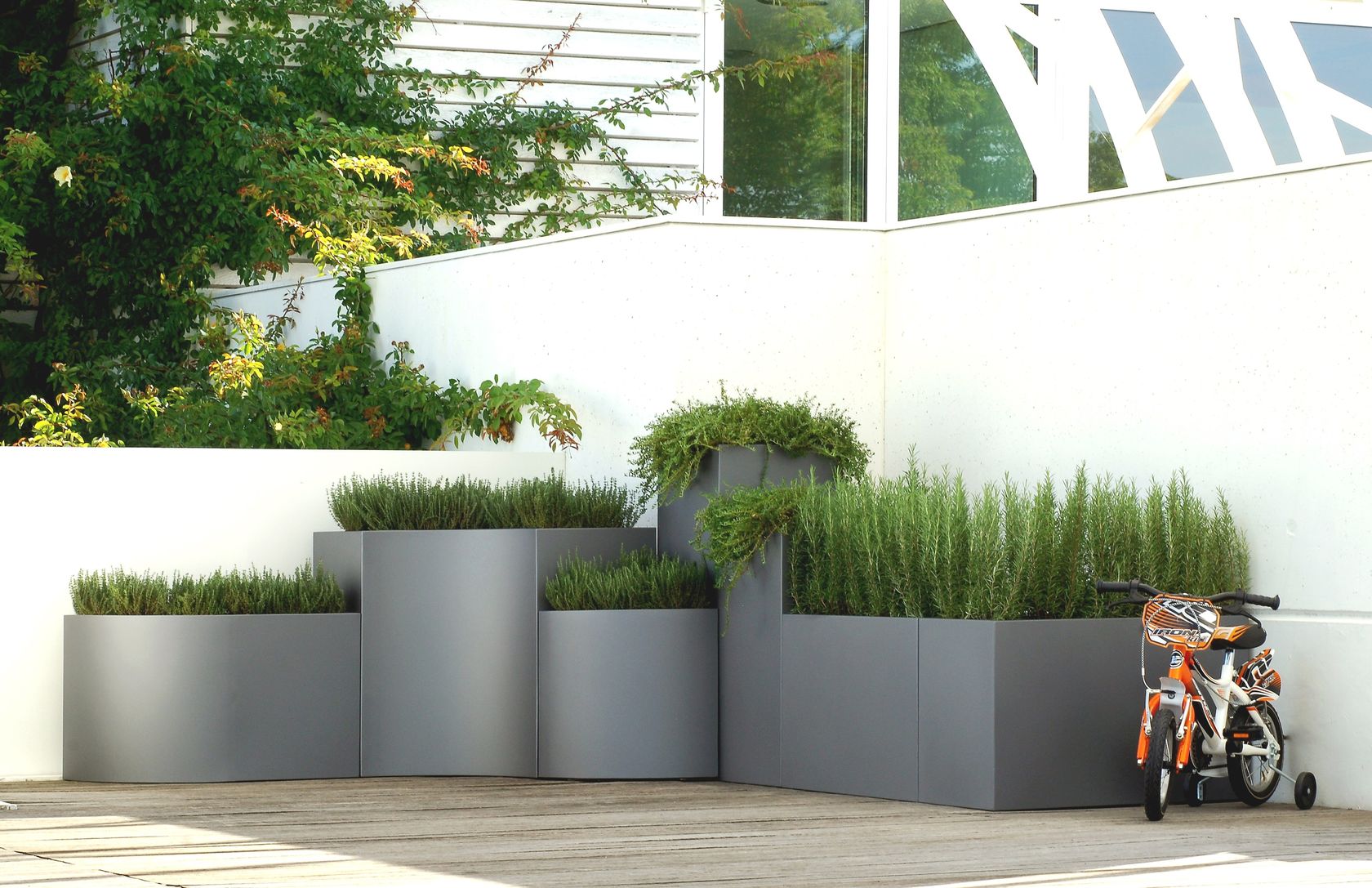A Modular stainless steel planter By BLOSS
