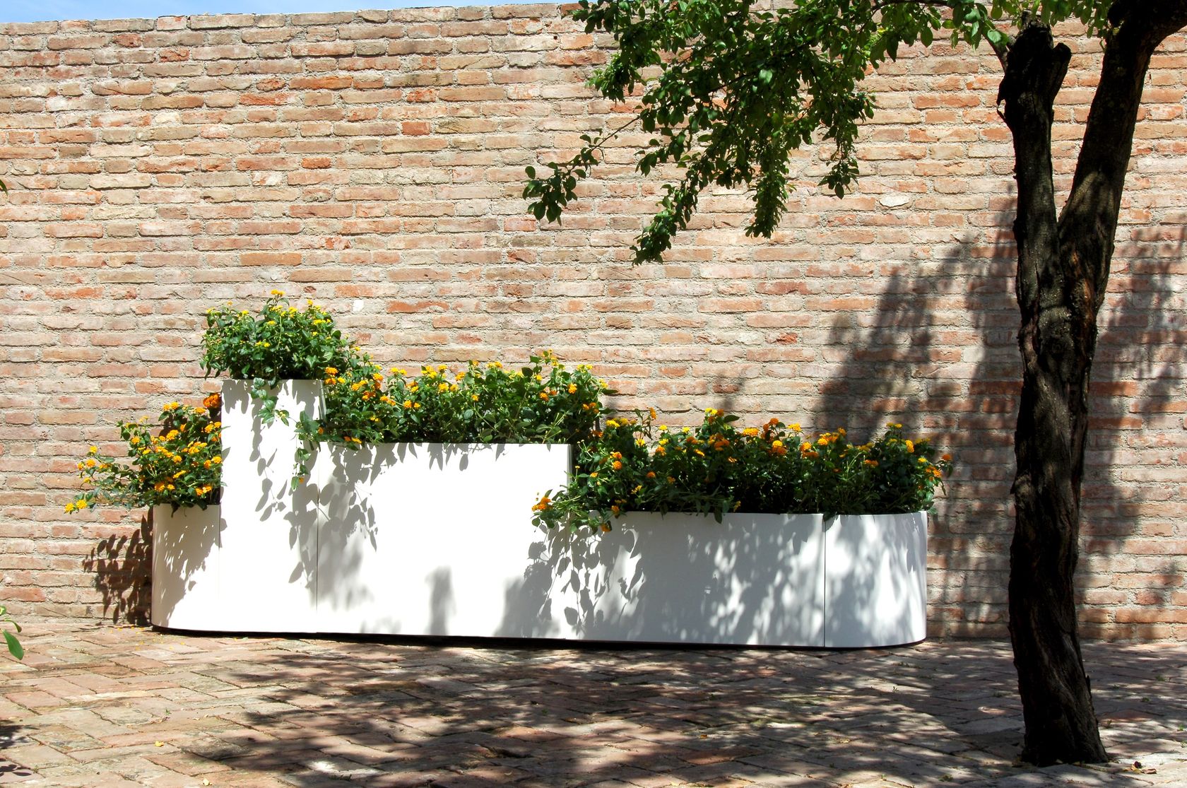 A Modular stainless steel planter By BLOSS