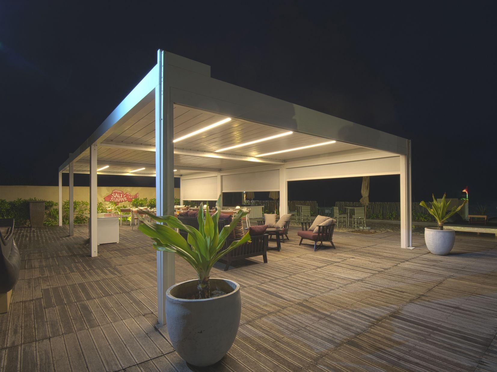 ALGARVE® Motorized pergola with adjustable louvers By RENSON