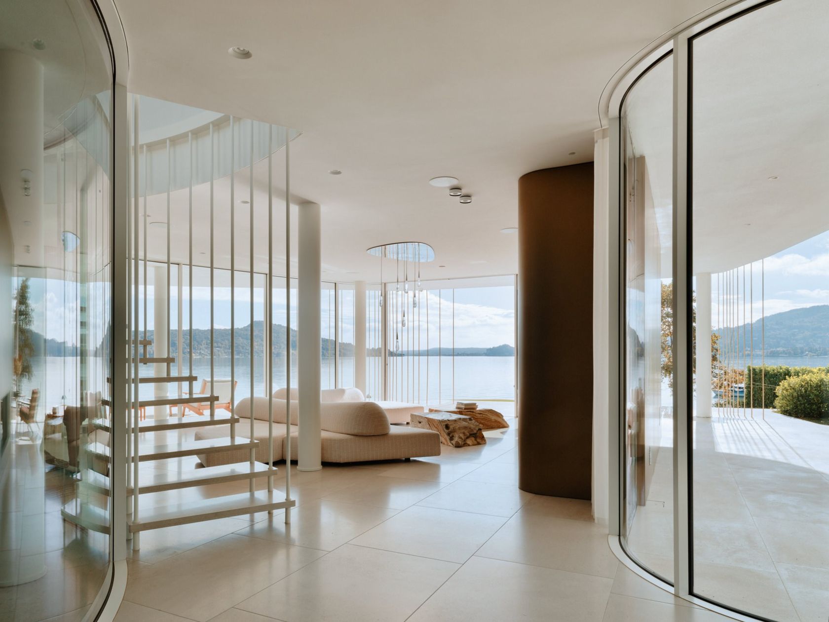 ARC Curved glass and aluminium sliding window By Sky-Frame