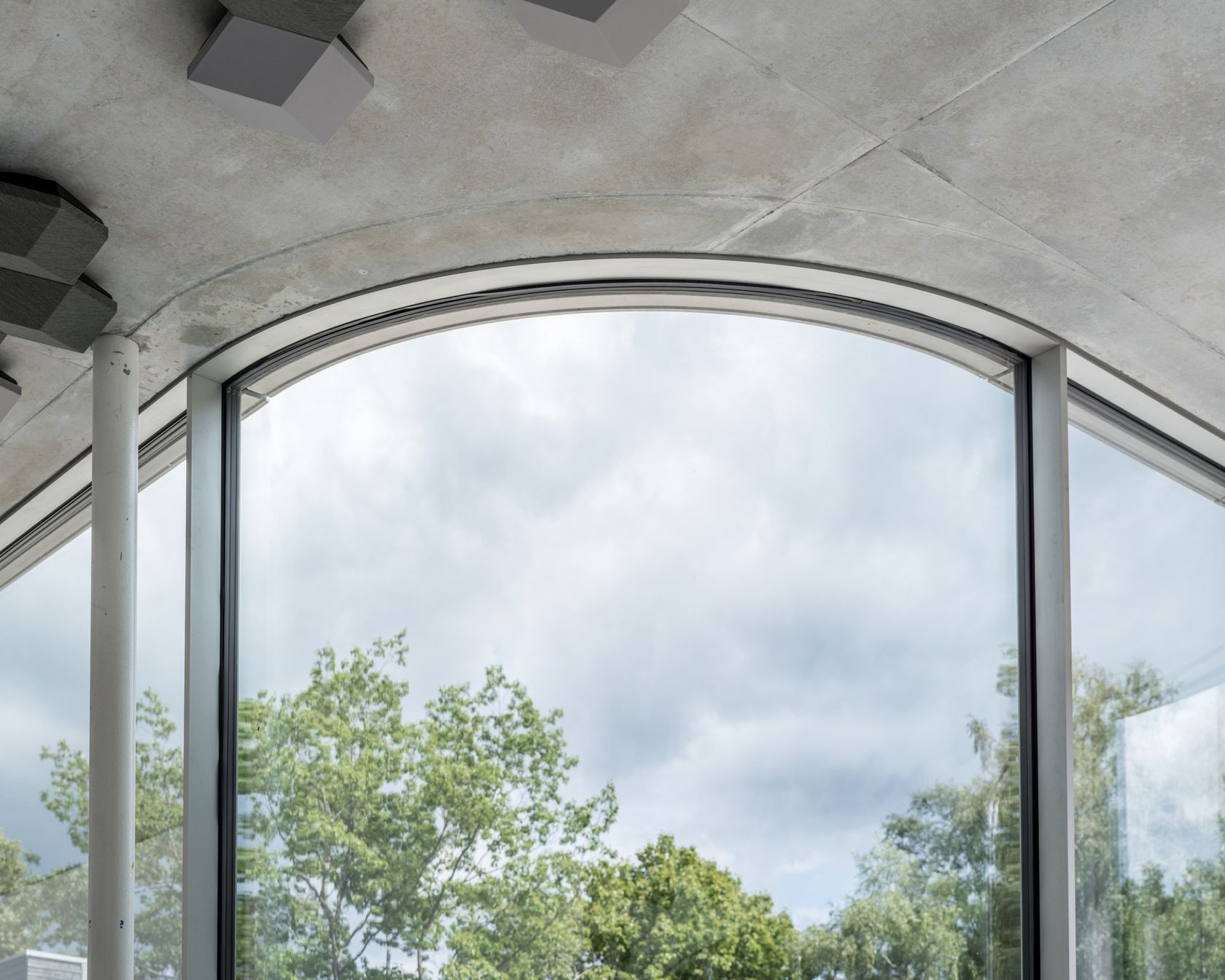 ARC Curved glass and aluminium sliding window By Sky-Frame