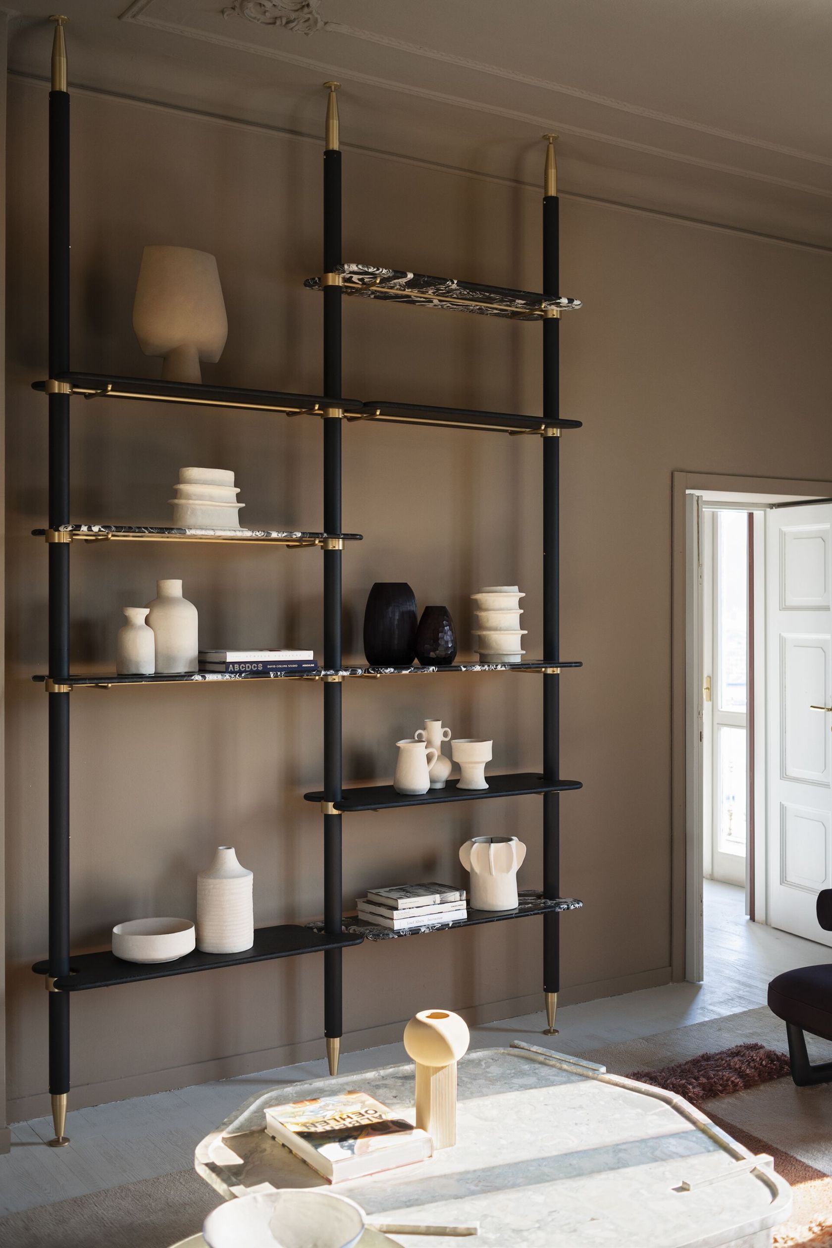 LLOYD Floor-ceiling mounted bookcase By BAXTER