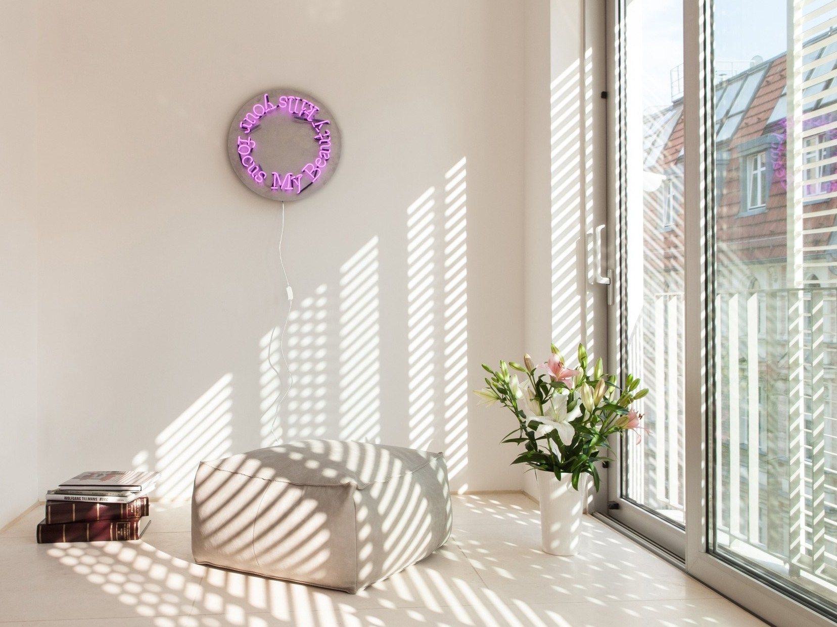 Wall-mounted neon light installation BEAUTY By sygns